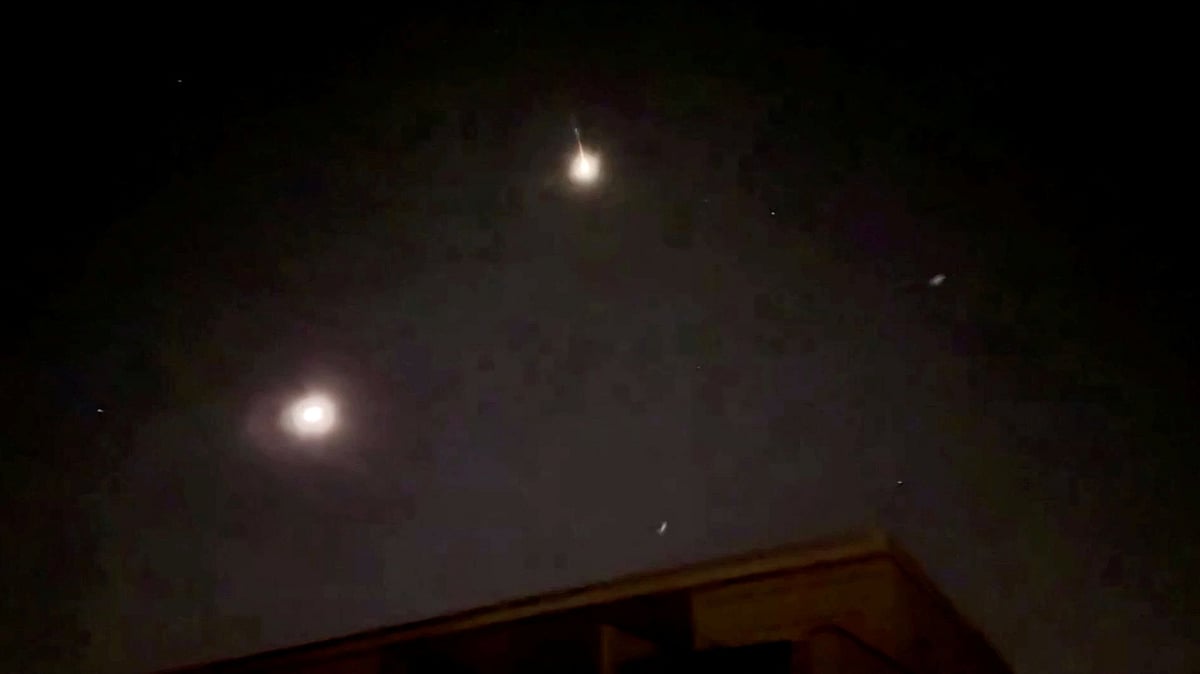 Is that a meteor over Manhattan? New Yorkers glance up, then shrug.