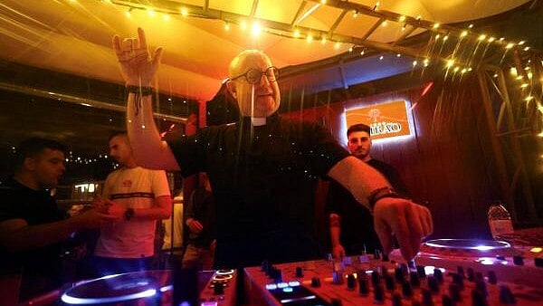 Portuguese 'DJ priest' plays upbeat tunes to spread hope