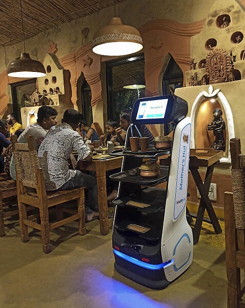 'Please allow me to pass', says robot Ananya as she serves food in ...