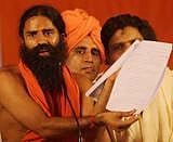 Govt, Baba trade charges