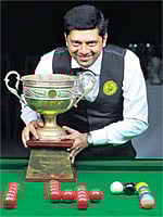 Manudev retains snooker crown