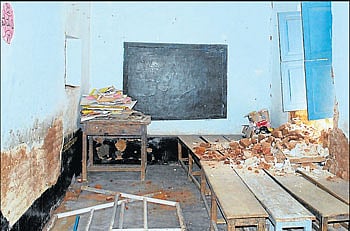 School wall collapses; students on porch