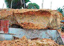 Wall caves in, worker buried alive