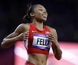 Felix leads US track stars to triple gold