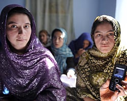 Afghan women learn literacy through mobile phones