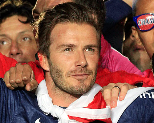 Tearful Beckham bids farewell to Paris