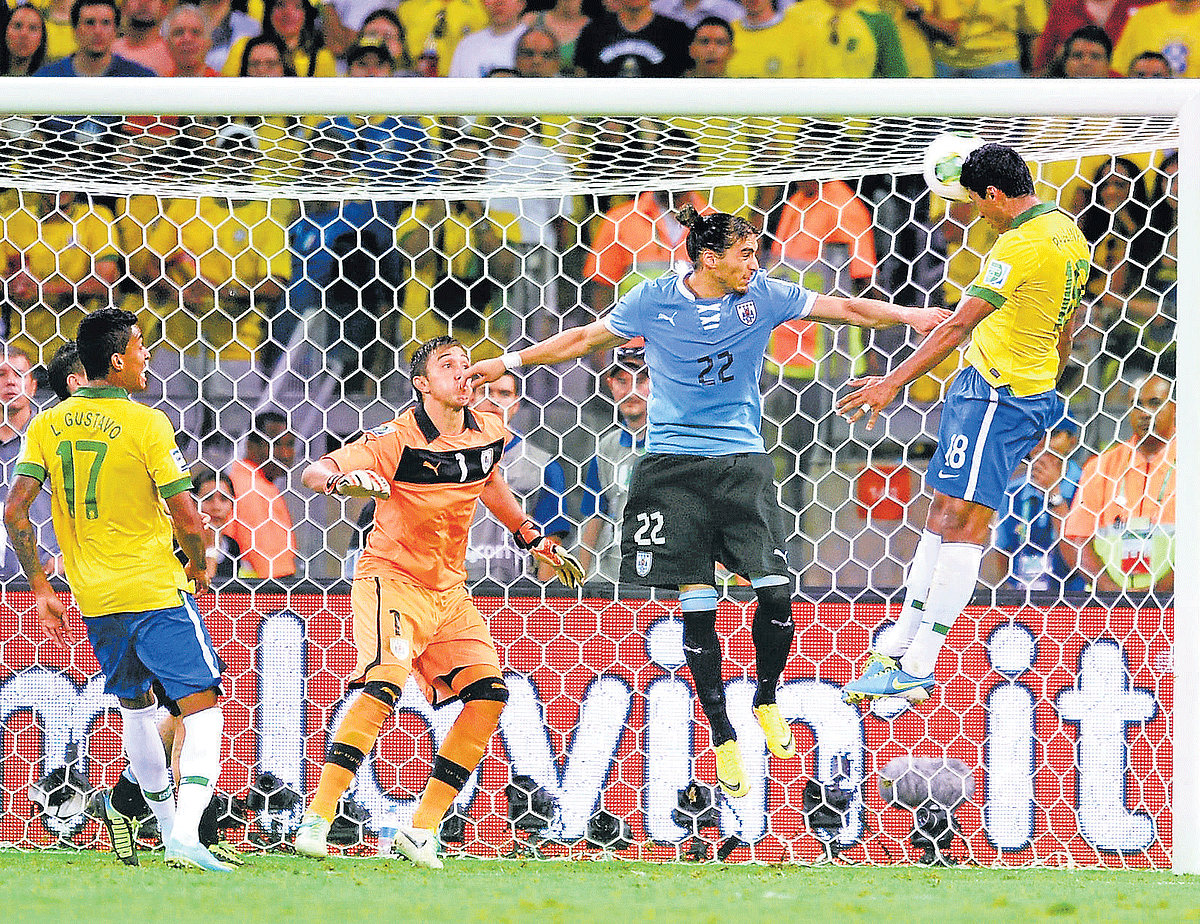 Paulinho heads Brazil home