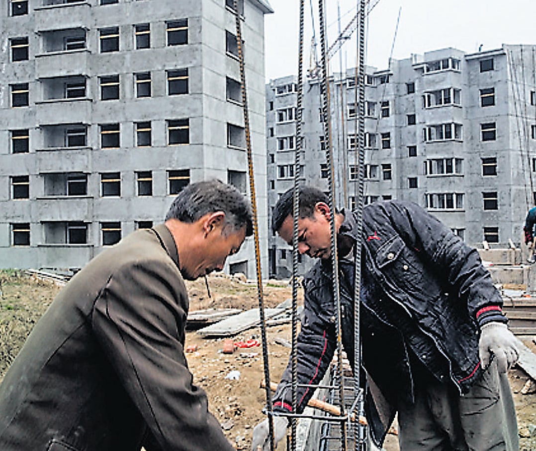 China moving millions from their rural homes