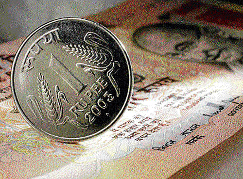 Rupee firms up by 24 paise vs dollar in the late morning