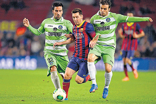 Messi stars in Barca win