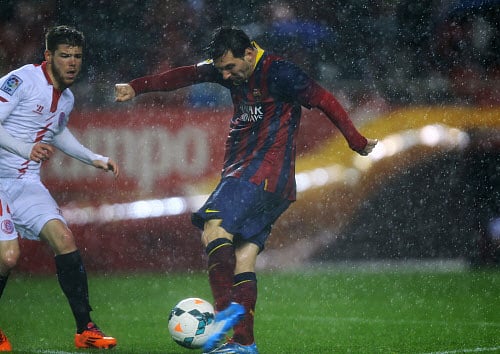 Messi double puts Barca in lead