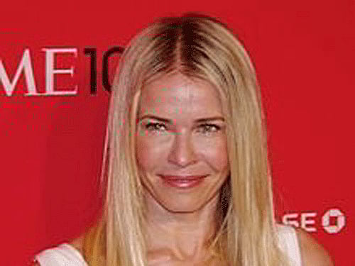Chelsea Handler poses topless
