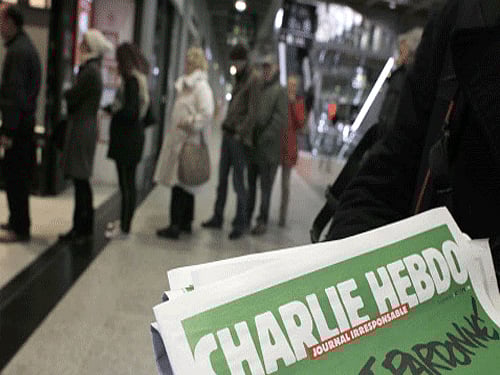 Charlie Hebdo returns to newsstands with satire and emotion
