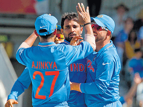 Cool Dhoni douses Windies fire