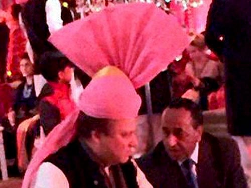 Sharif dons pink turban gifted to him by Modi at wedding