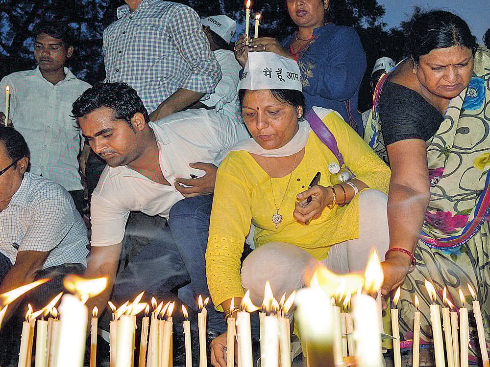 Candlelight march demands justice for NDMC official