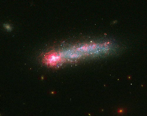 Hubble spots stellar fireworks in 'skyrocket' galaxy