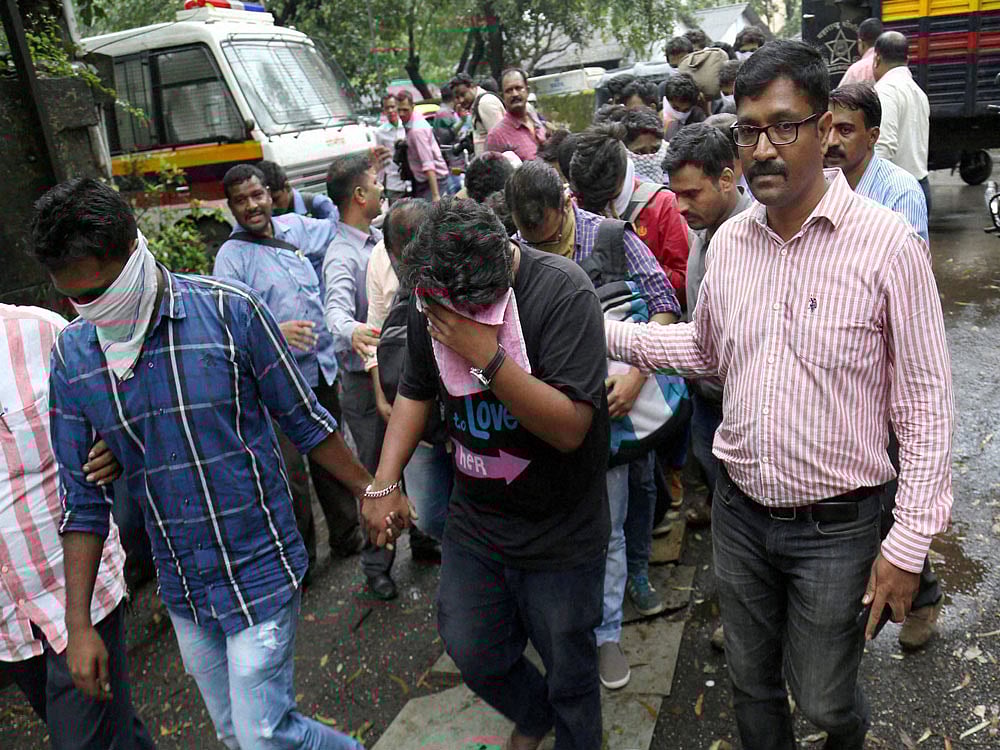 US charges 61 people in Indian call center scam