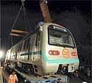 DMRC lowers rail coaches on new line for trial runs
