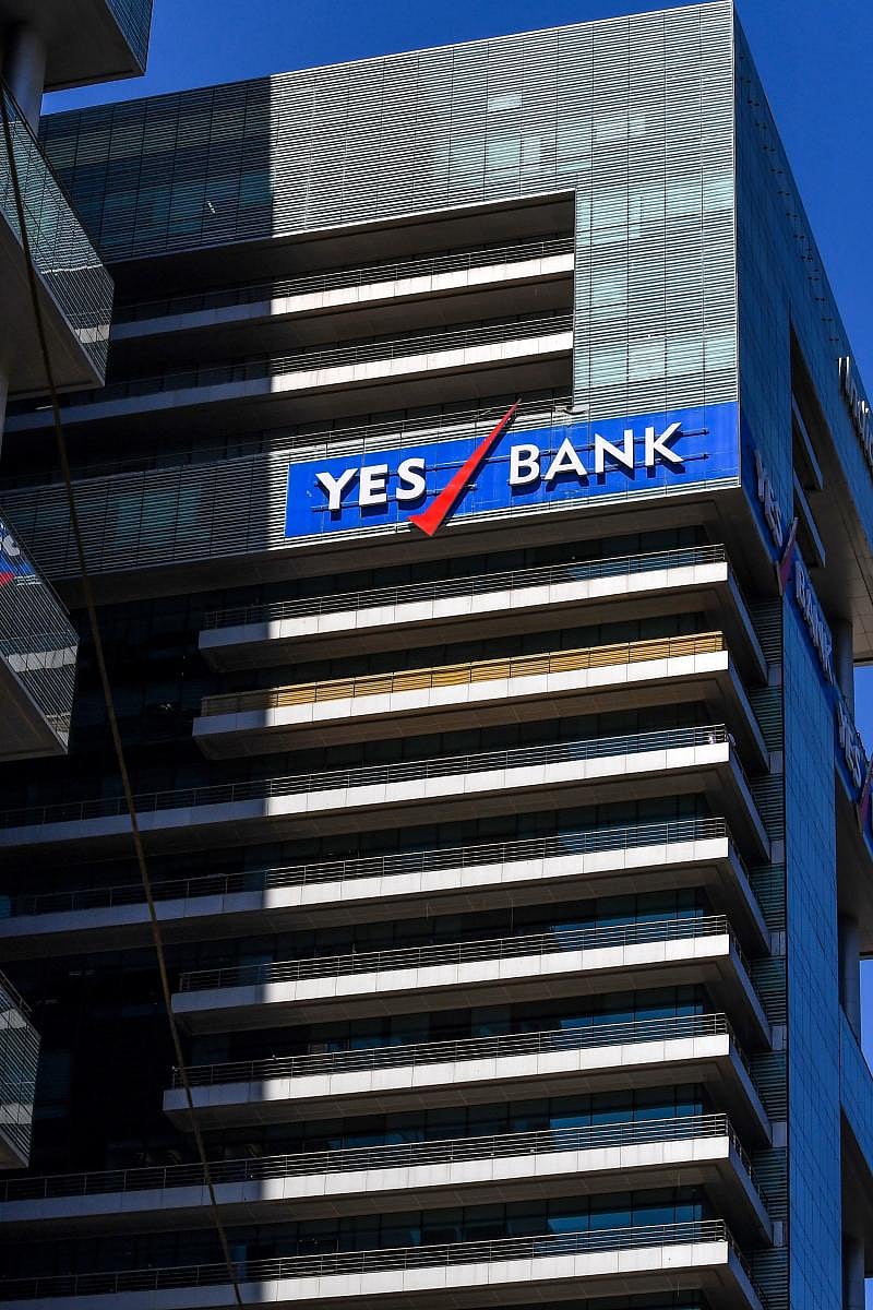 Yes Bank clocks record Rs 18,564-crore loss in Q3; NPAs surge; Run on ...