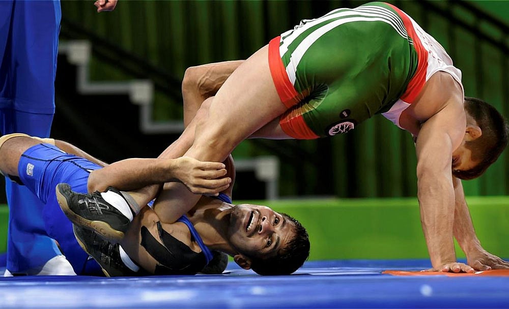 Rahul Aware opens wrestling gold account