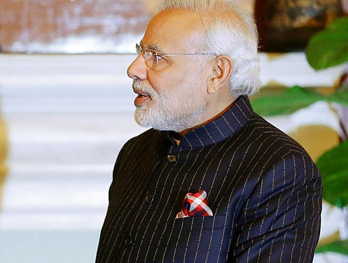 Modi's monogrammed suit enters Guinness Book