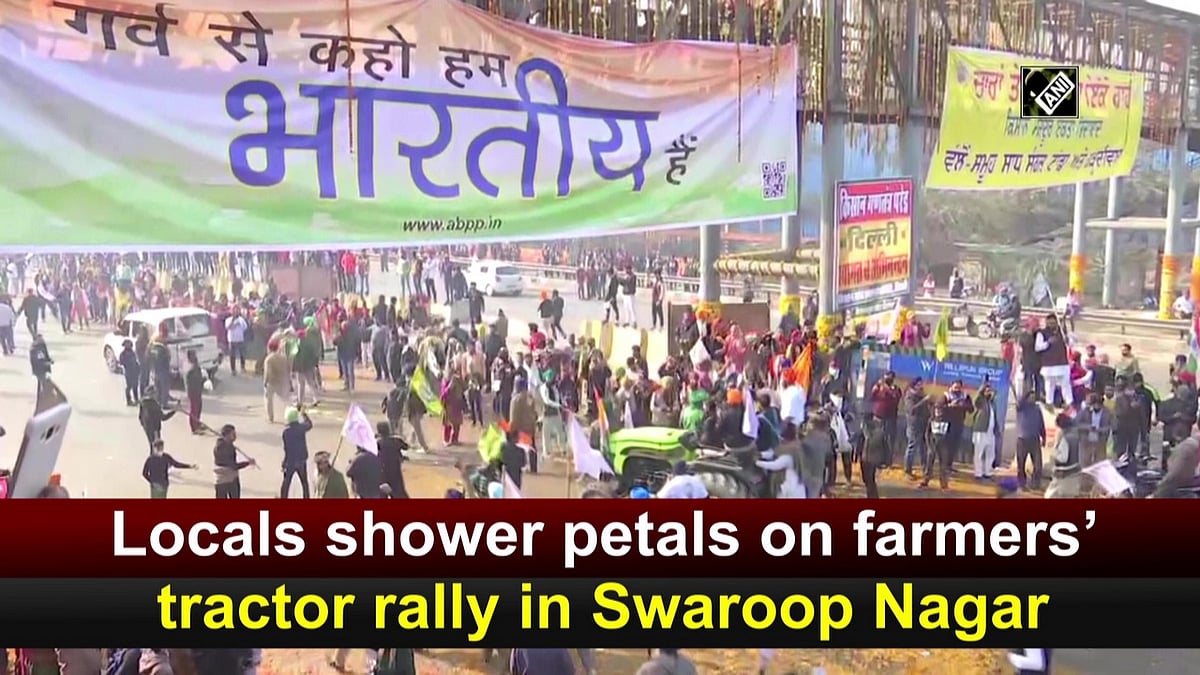 Locals shower petals on farmers’ tractor rally in Swaroop Nagar