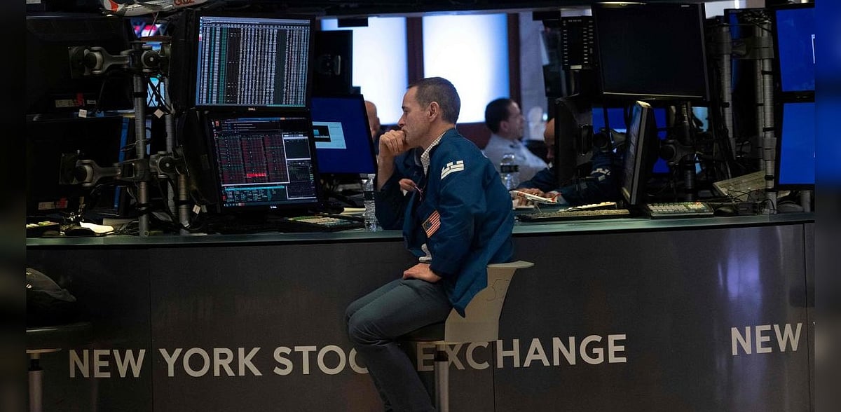 Dow climbs at open after Federal Reserve announcement, Nasdaq retreats