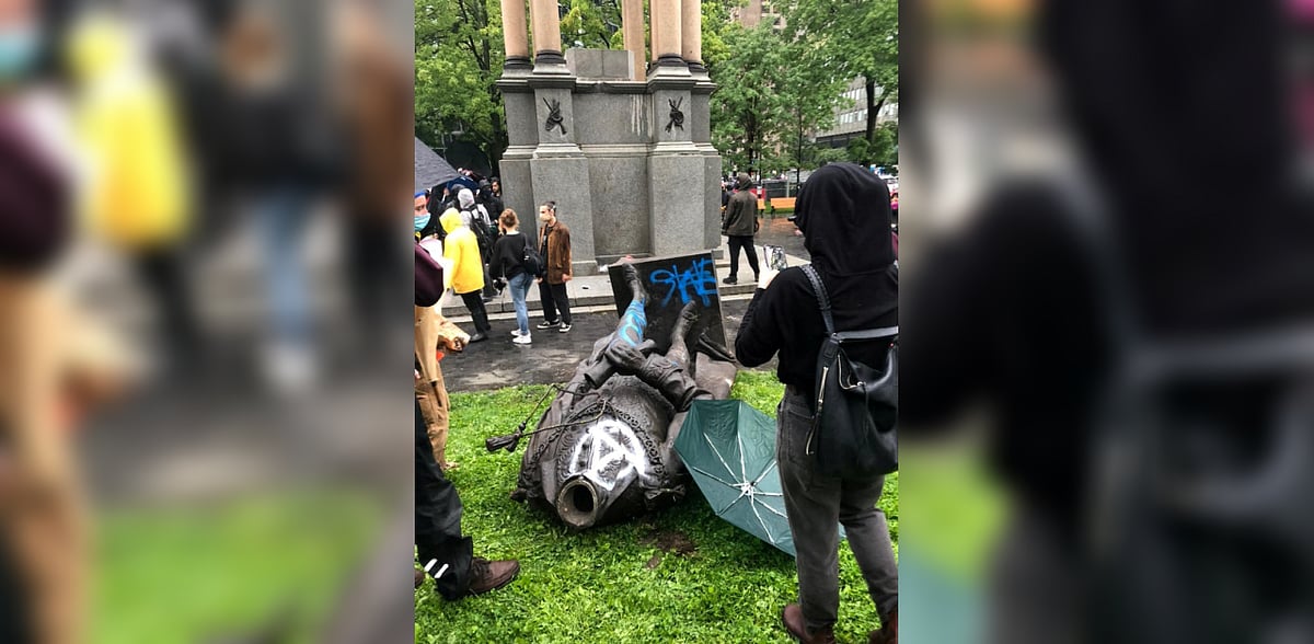 Statue of Canada's first prime minister toppled by protesters demanding ...