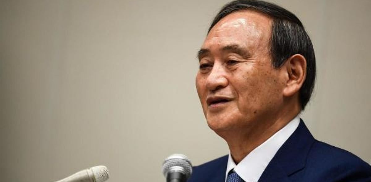 Japan's Yoshihide Suga signals readiness to prod Bank Of Japan to ease more
