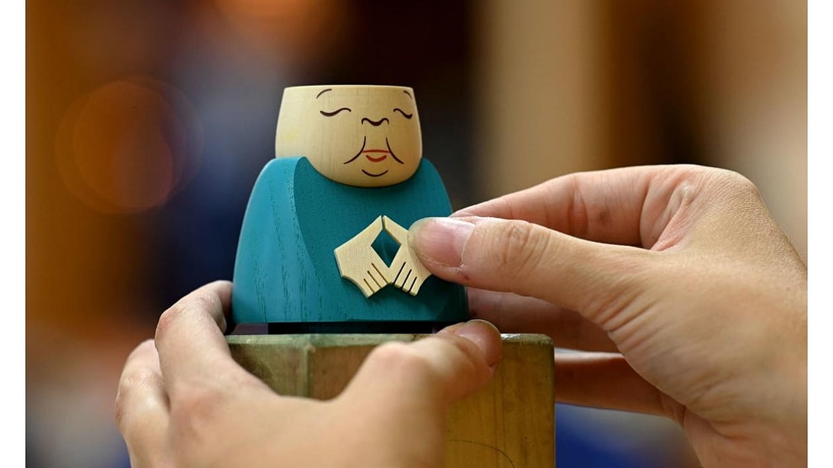 The Merkel rhombus: How a hand gesture became a brand