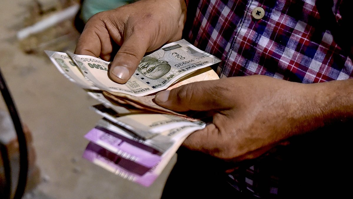 Rupee slumps 22 paise to close at 75.58 against US dollar