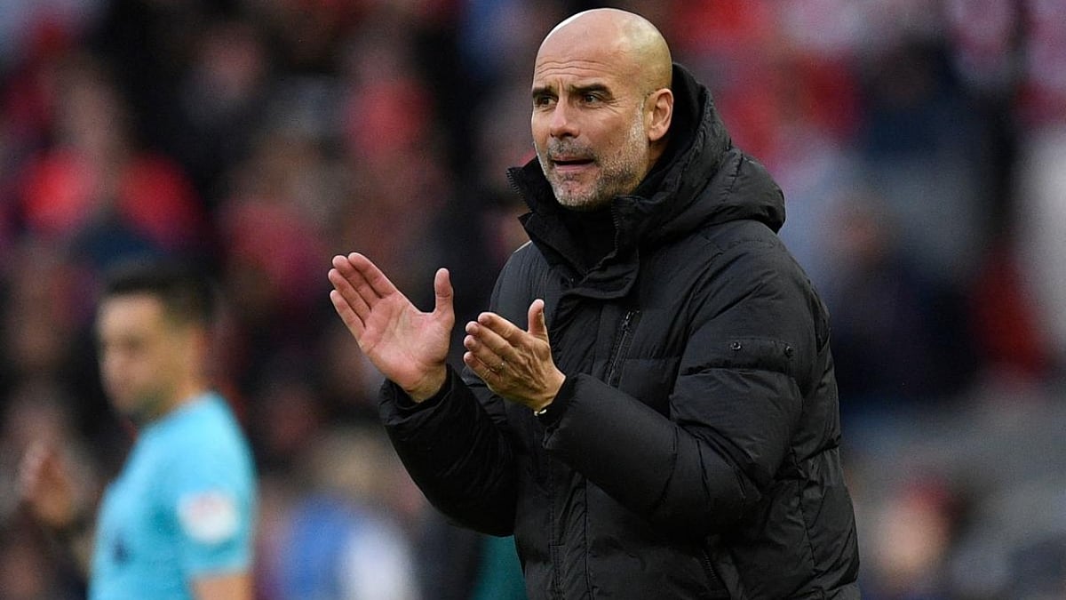 Pep Guardiola says Liverpool fans threw coins at him