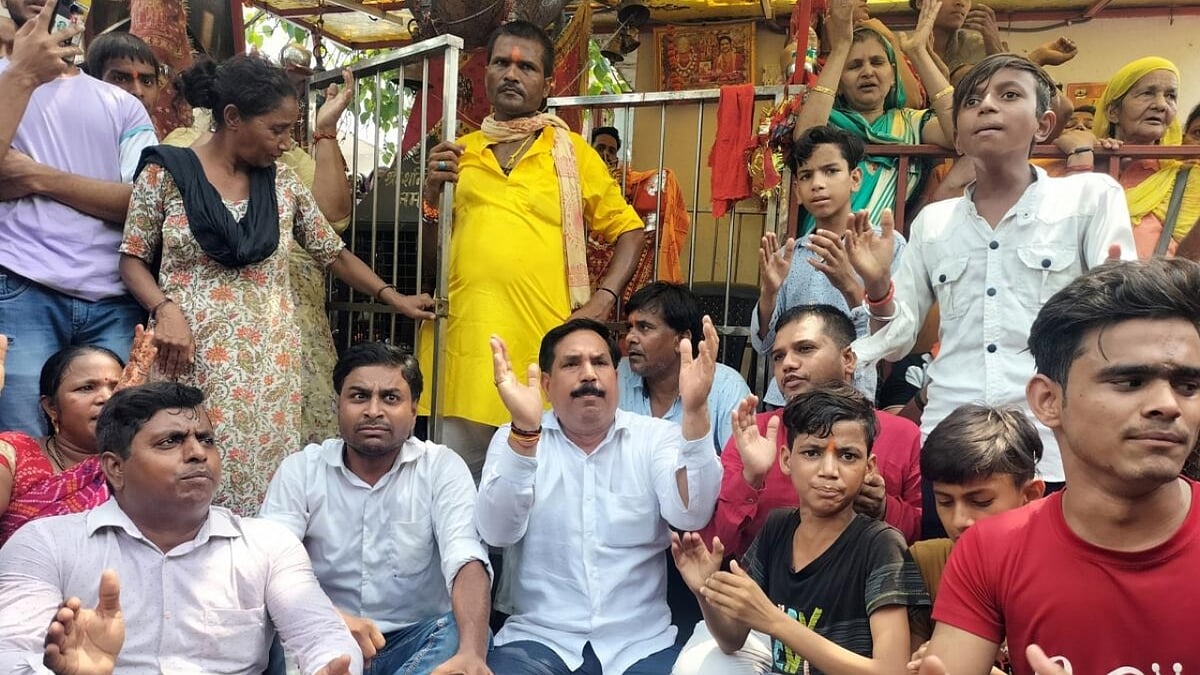 Locals protest outside temple in Delhi's Mandawali during encroachment ...