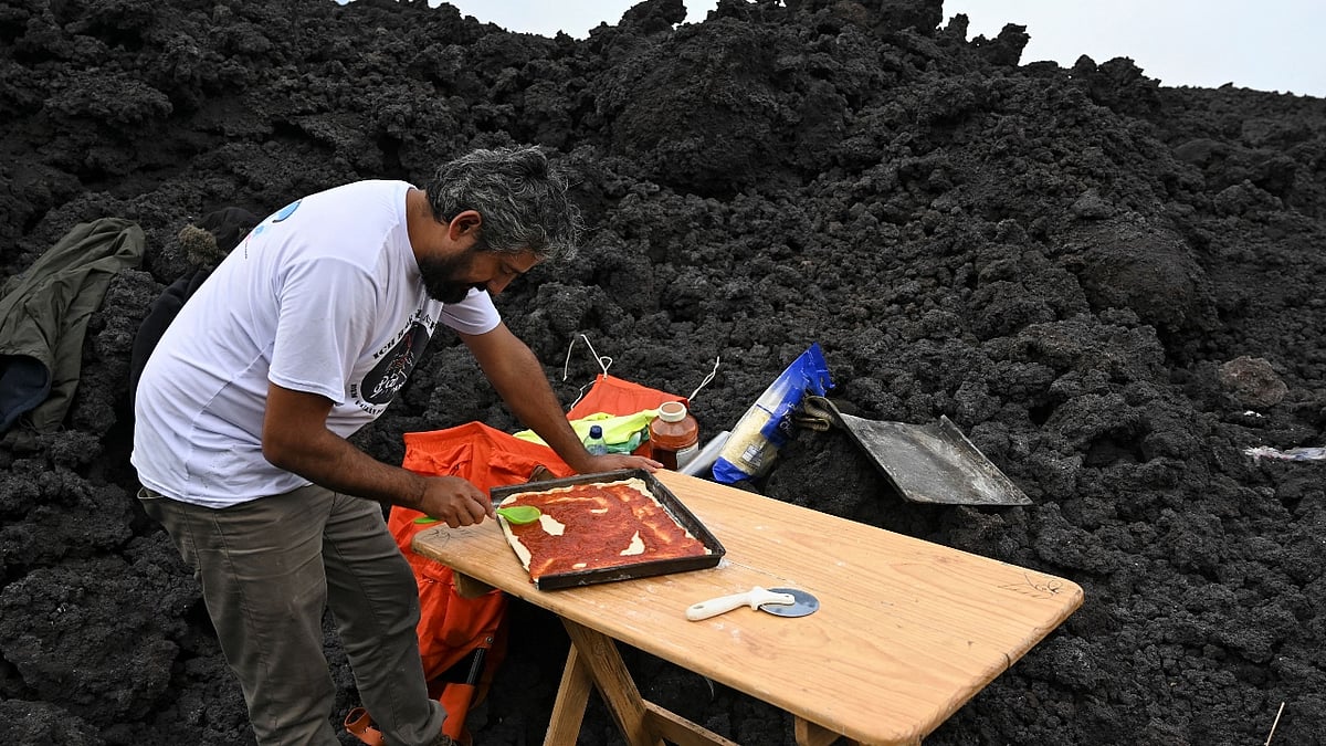 In Pics | Guatemalan Man serves pizza cooked on volcano's molten lava