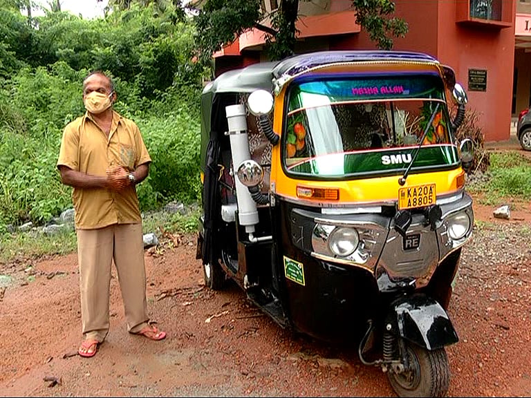 This auto rickshaw in Udupi is equipped with hand wash, sanitiser to ...