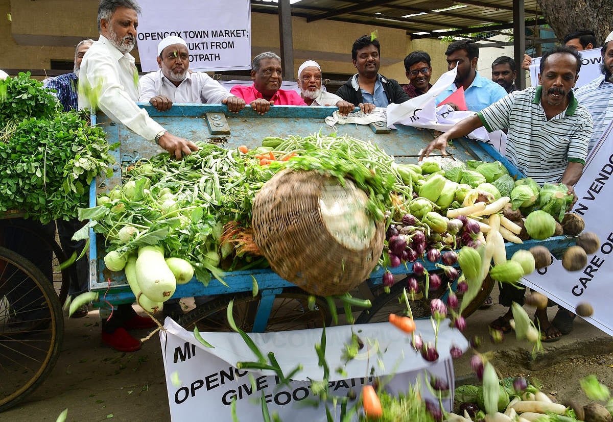 Vendors throw veggies to protest delay in opening of new market